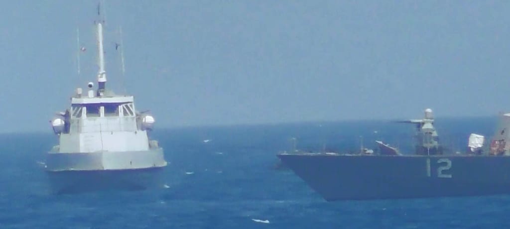Navy Ship Fires Warning Shots at Iranian Vessel | Defense Media Network